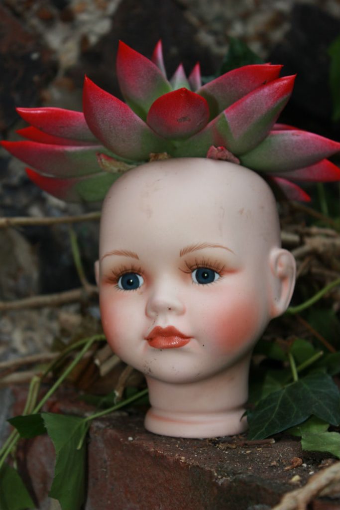 18 DIY Doll Head Planter Ideas and Projects in 2024 - FarmFoodFamily