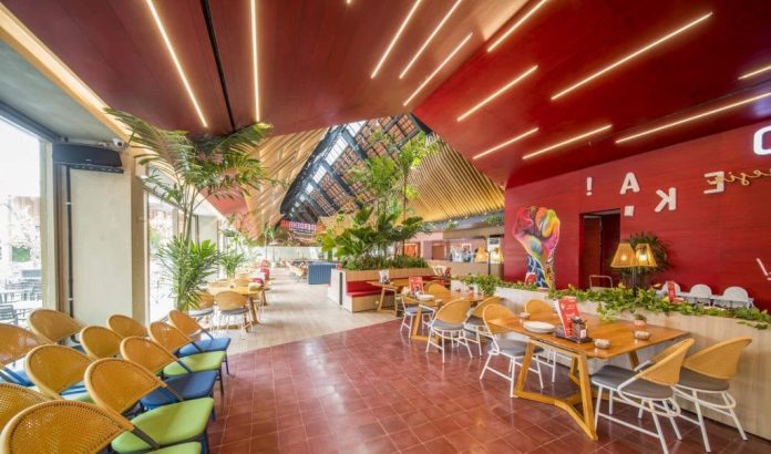 Creating an Energizing Red Restaurant Design with Fluted Wall Panels